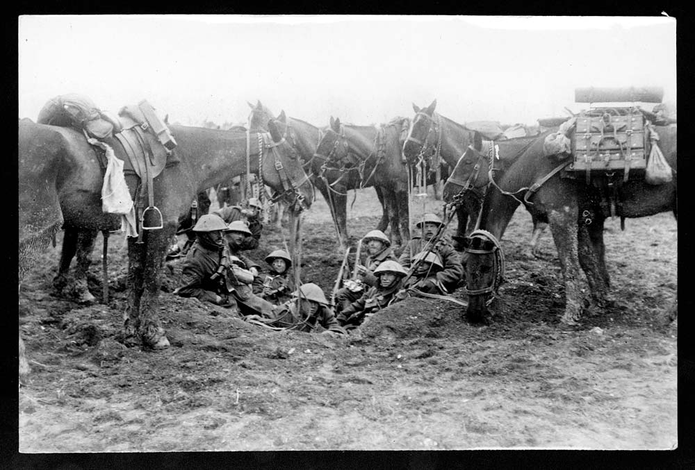 (7) C.1541 - Cavalrymen resting in a shell hole waiting for the order ...