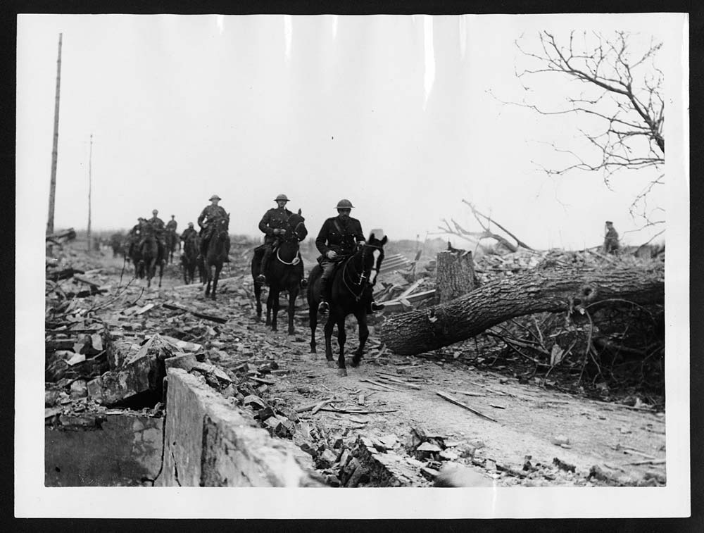 (10) C.1585 - Cavalry officer leading his men through a ruined village ...