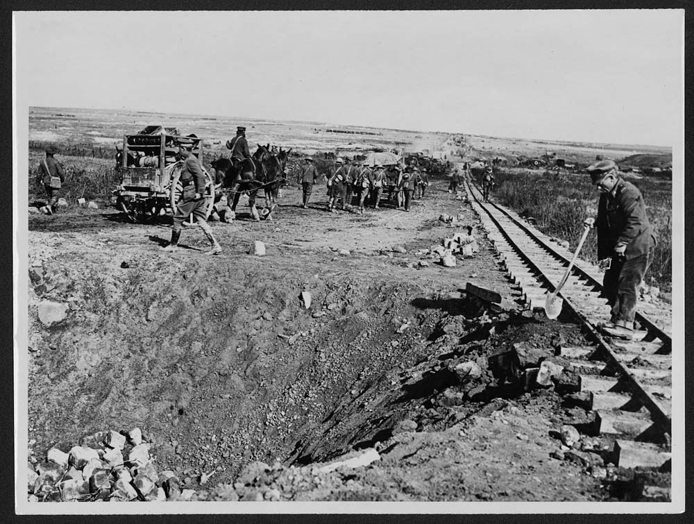 (15) L.1181 - Germans mined the road but our transport easily got round ...